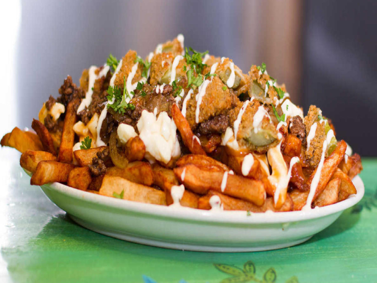 Taste Poutine in Montreal - Canada Travel Guide | Flamingo Travels